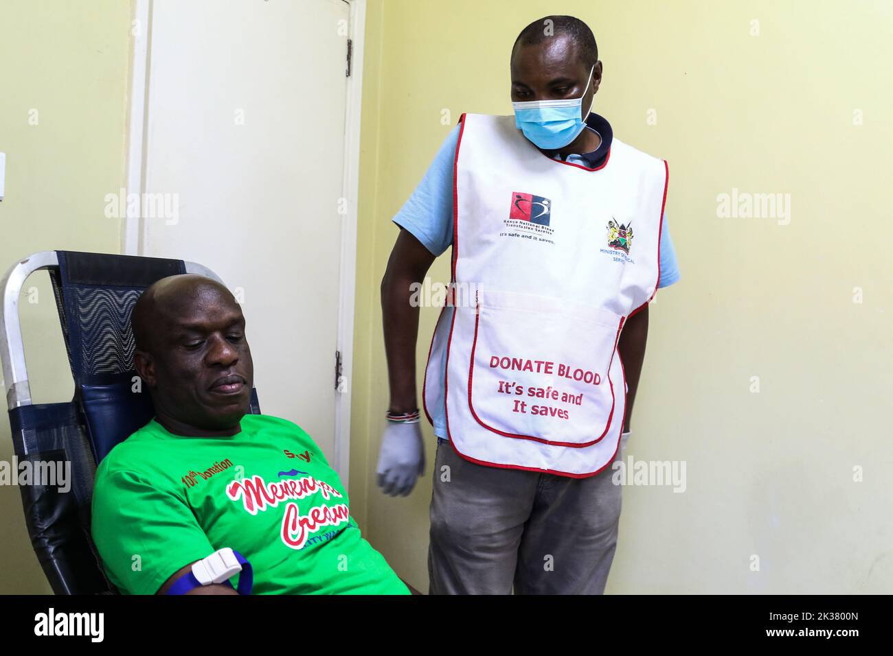 Alpha Kennedy Sanya (L), Kenya’s blood ambassador is seen donating ...