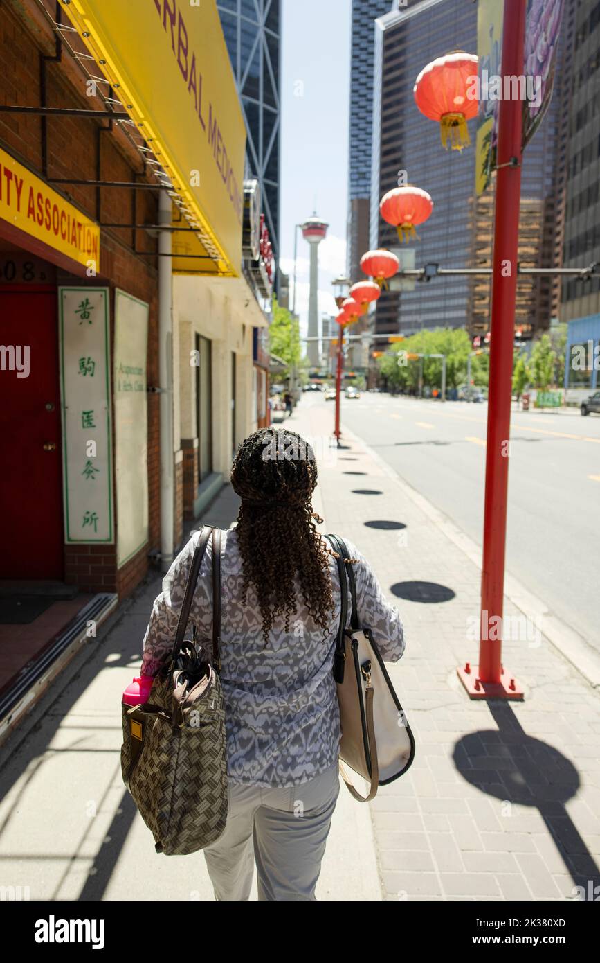 Woman walking past hi-res stock photography and images - Alamy