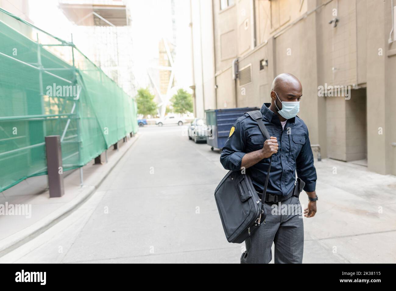 Security man wearing black uniform hi-res stock photography and images ...