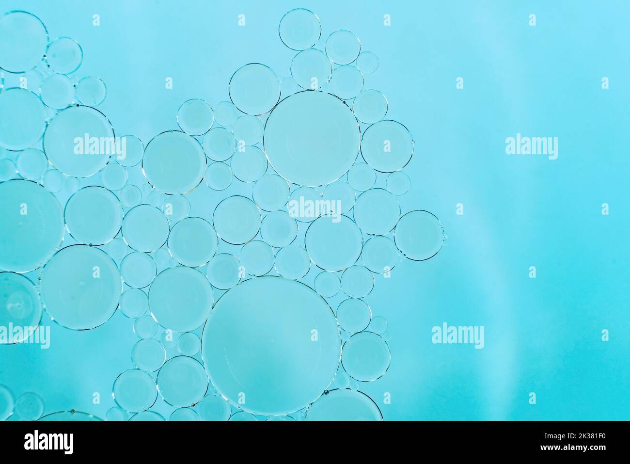 Drops of fat in water. Bubbles of fat close up.Oil Stock Photo - Alamy