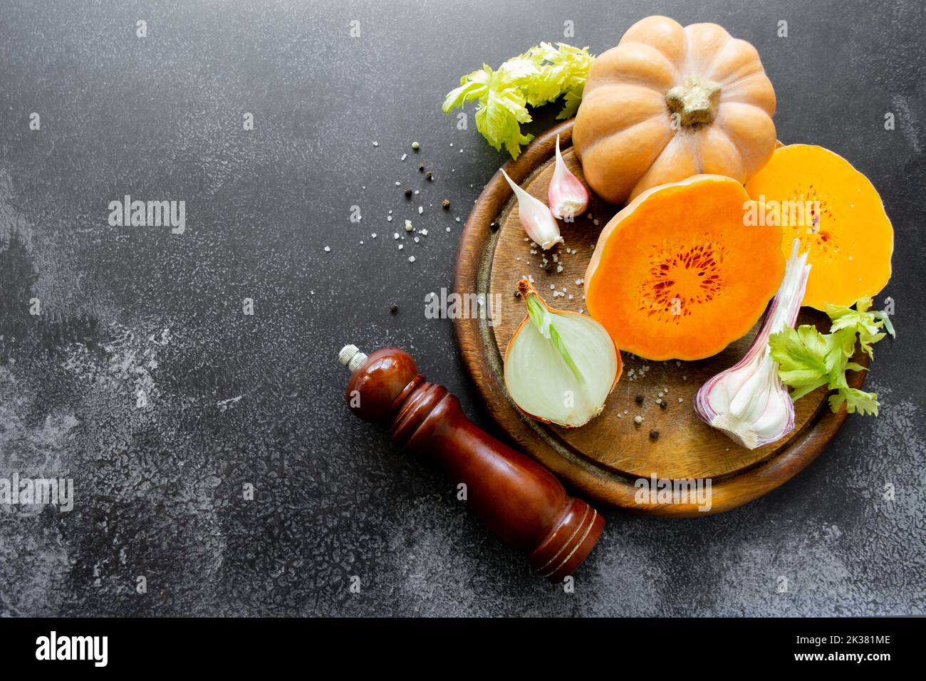 Vegetables: orange squash, garlic, onions. Spice mill, pepper, salt ...