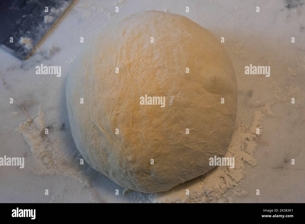 Homemade bread dough freshly made on counter top Stock Photo - Alamy