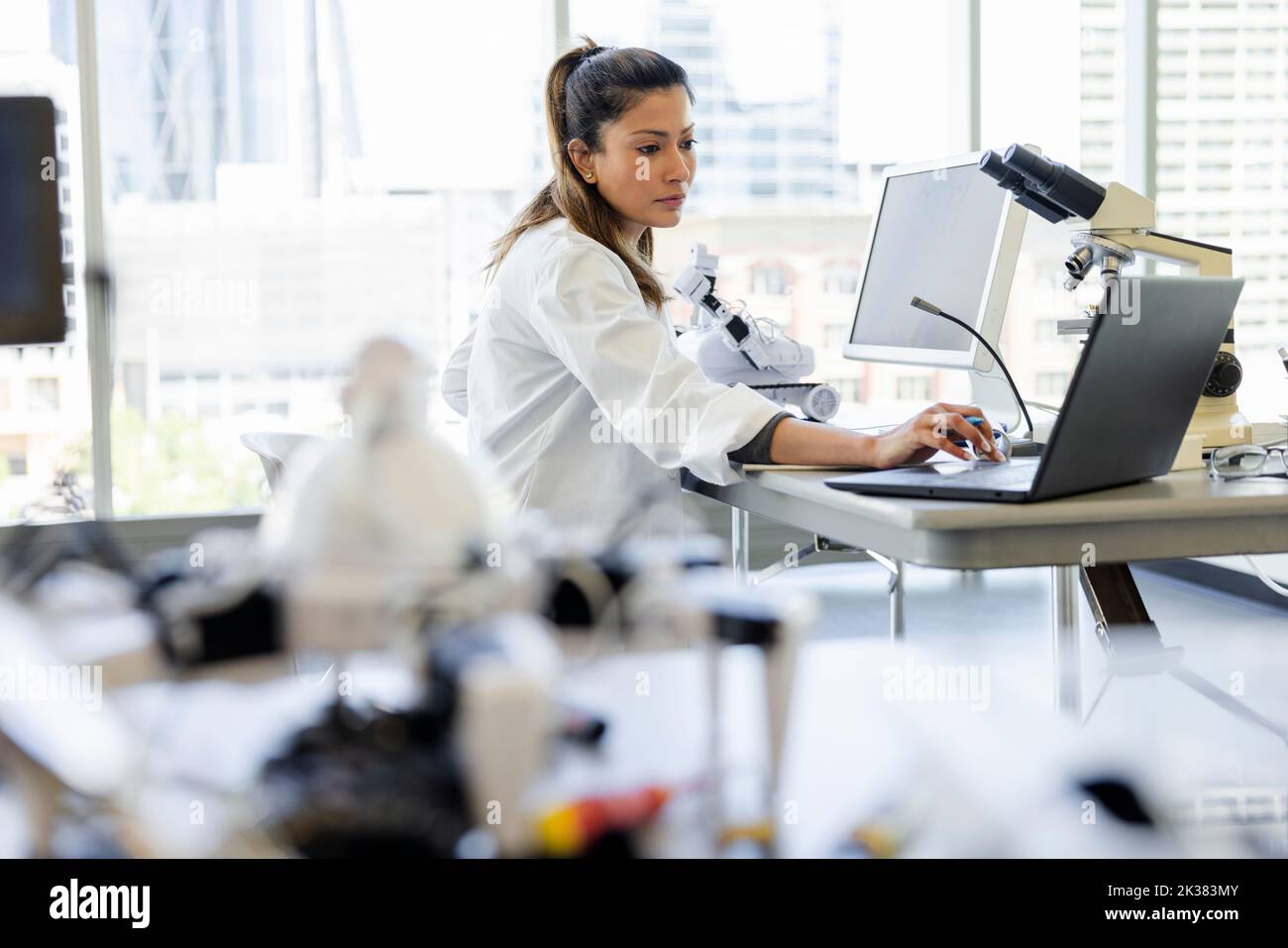 Asian scientist using equipment hi-res stock photography and images - Alamy