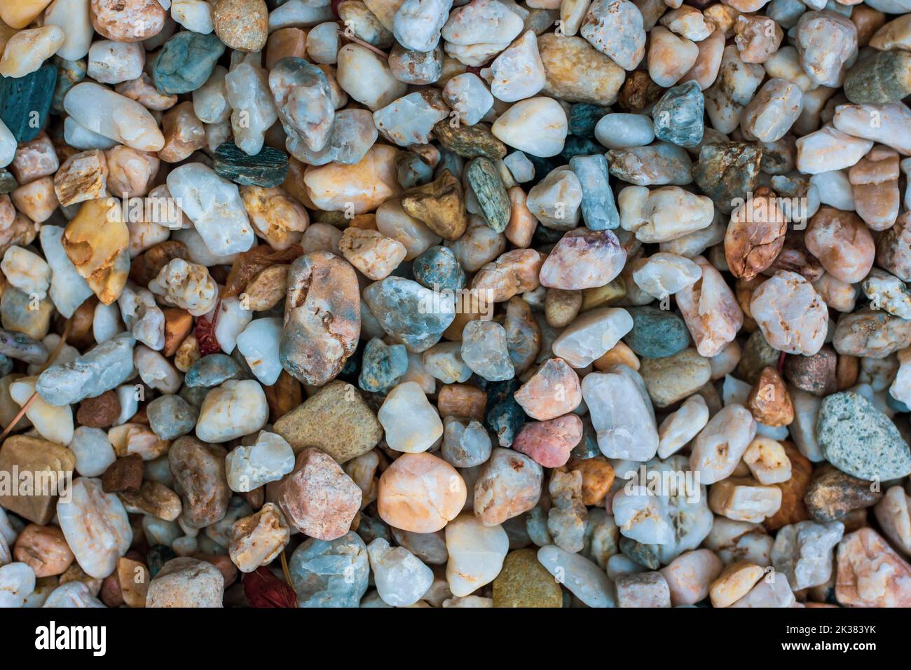Small stones gravel texture background Stock Photo - Alamy