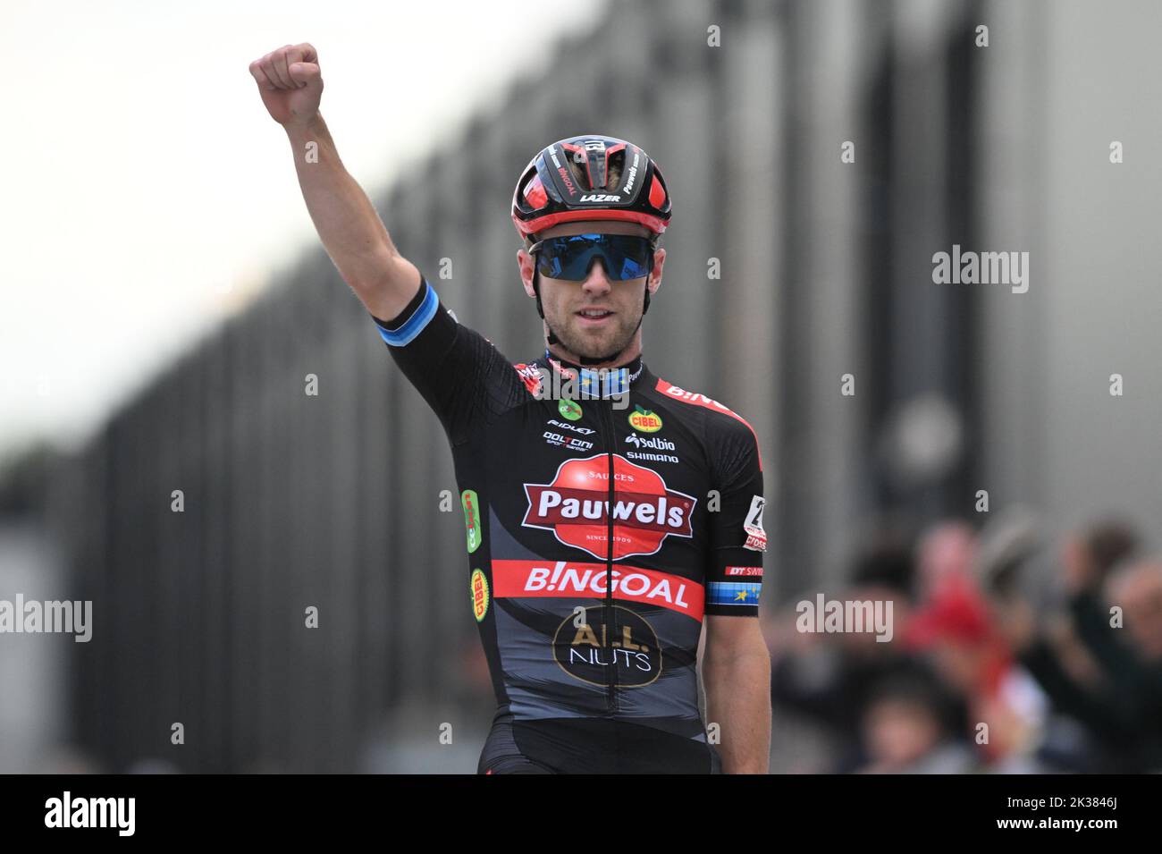Belgian Eli Iserbyt celebrates as he crosses the finish line to win the ...