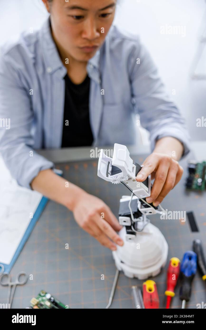 Engineer examining assembling technology hi-res stock photography and ...