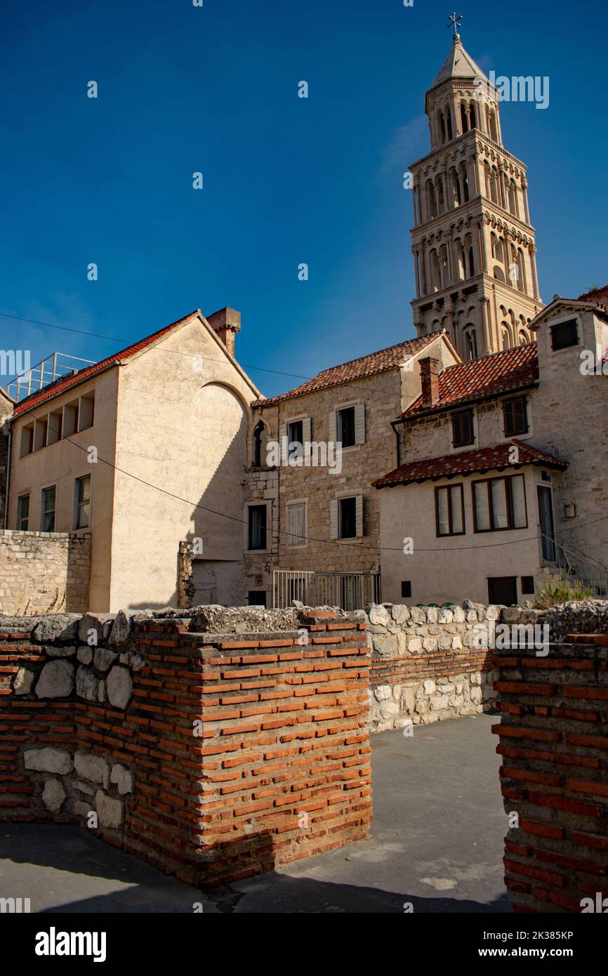 A vertical shot of the Romanesque bell tower of the Cathedral of Saint ...