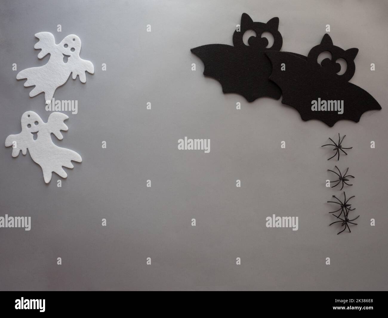 halloween gray color background with ghosts, bats and spiders Stock ...