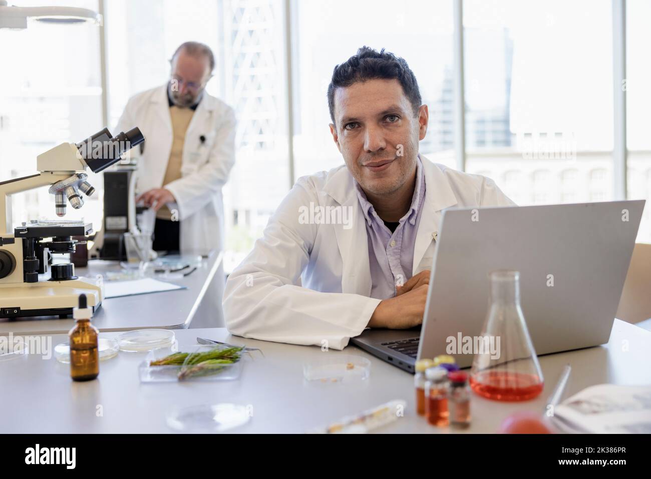 Handsome scientist hi-res stock photography and images - Alamy