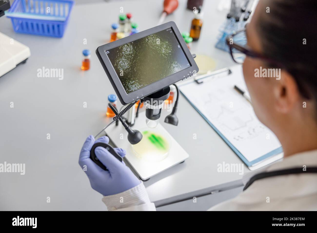 Asian scientist using equipment hi-res stock photography and images - Alamy