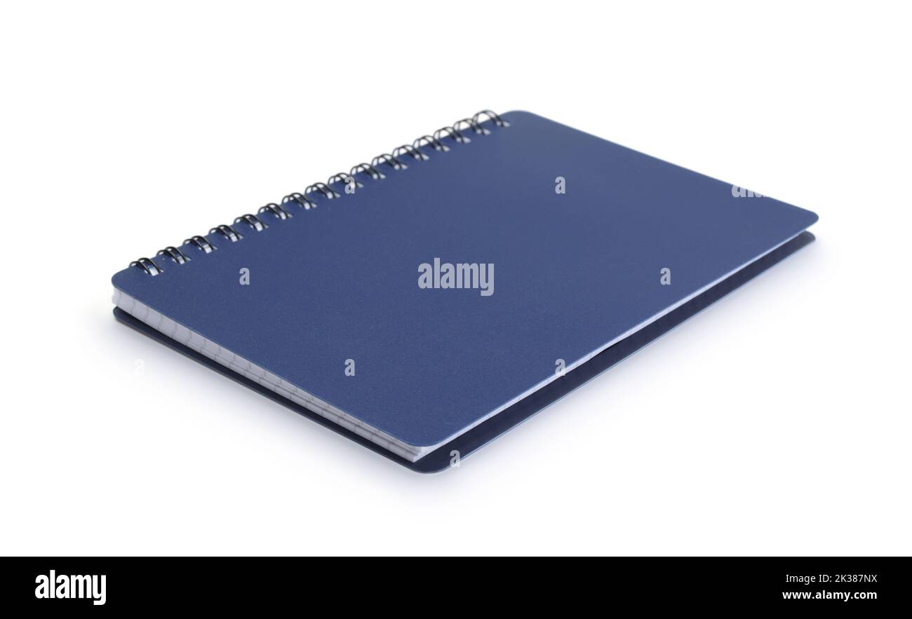 Blue closed notebook isolated on white. Side view Stock Photo - Alamy