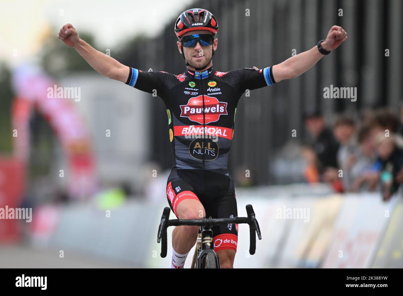 Belgian Eli Iserbyt celebrates as he crosses the finish line to win the ...