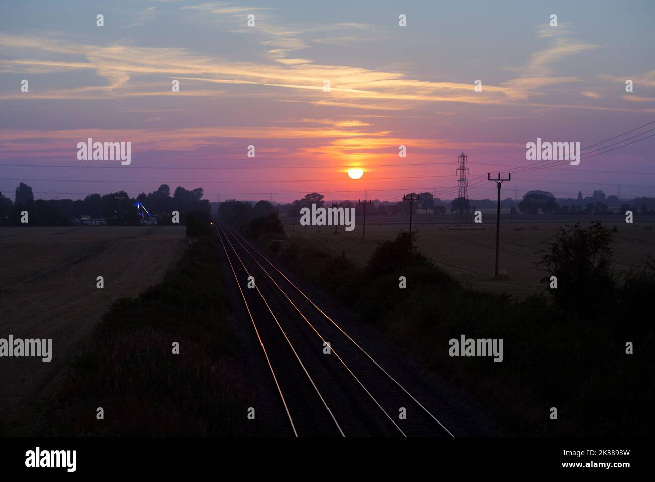 Sunset over the railway line at Great Coates, Lincolnshire, UK Stock ...