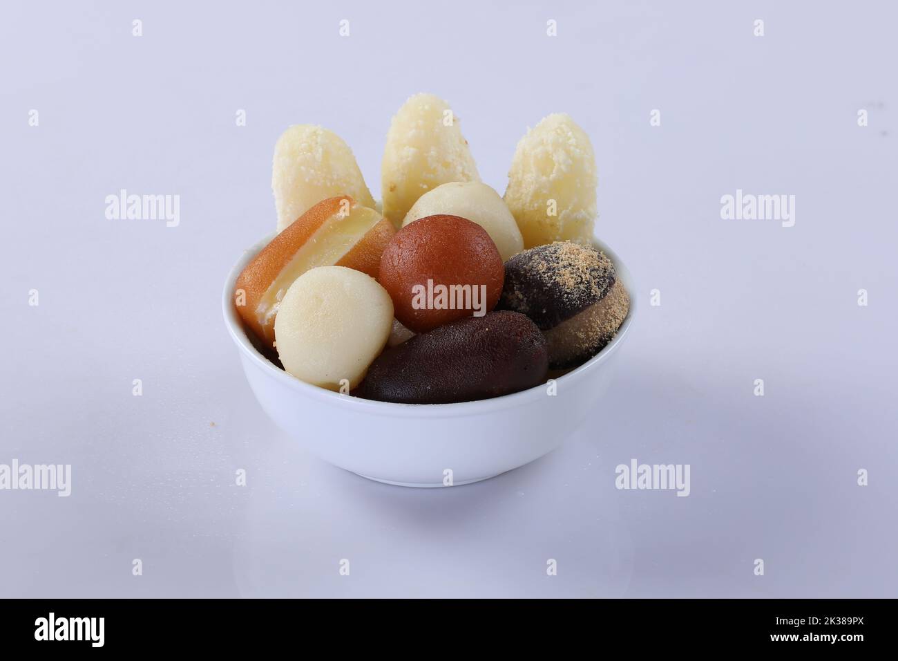 Bowl of Bangladeshi sweets isolated in white background Stock Photo - Alamy