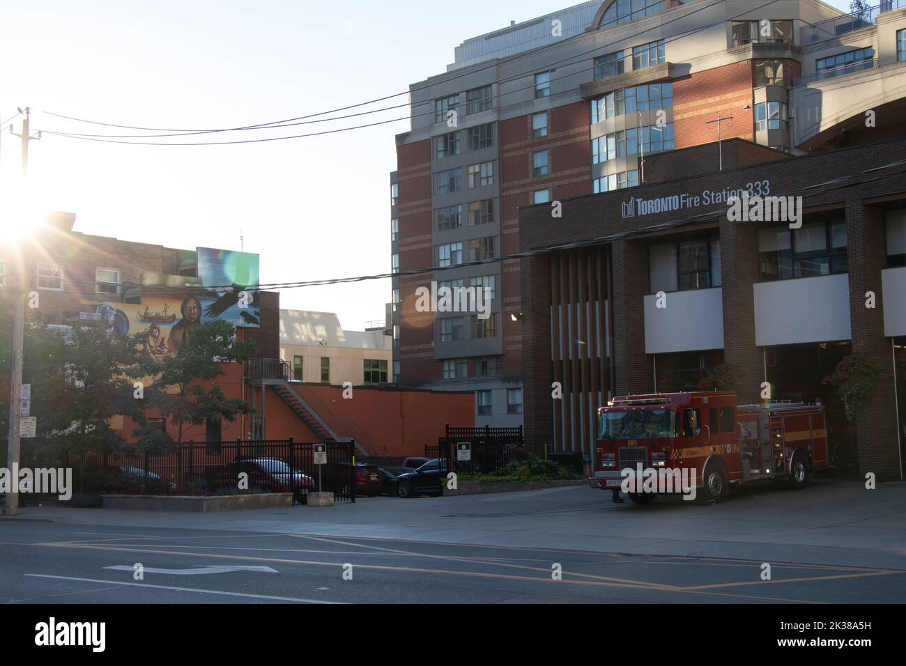 The morning glares down on a Toronto Fire, fire station, as a fire ...