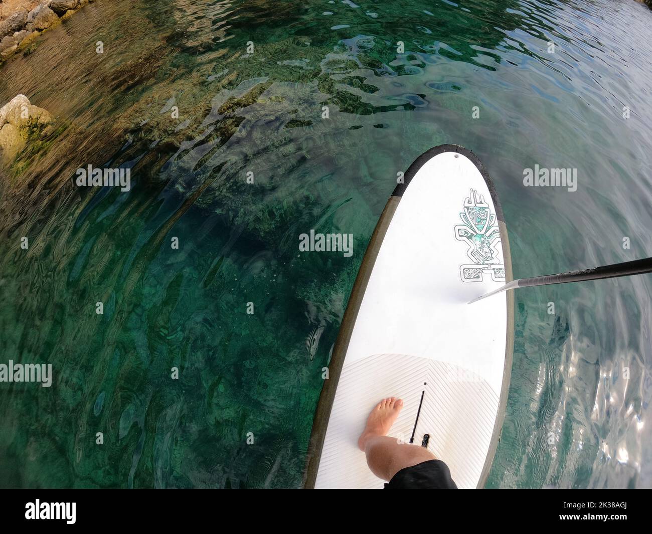 Man standing on surf board hi-res stock photography and images - Alamy