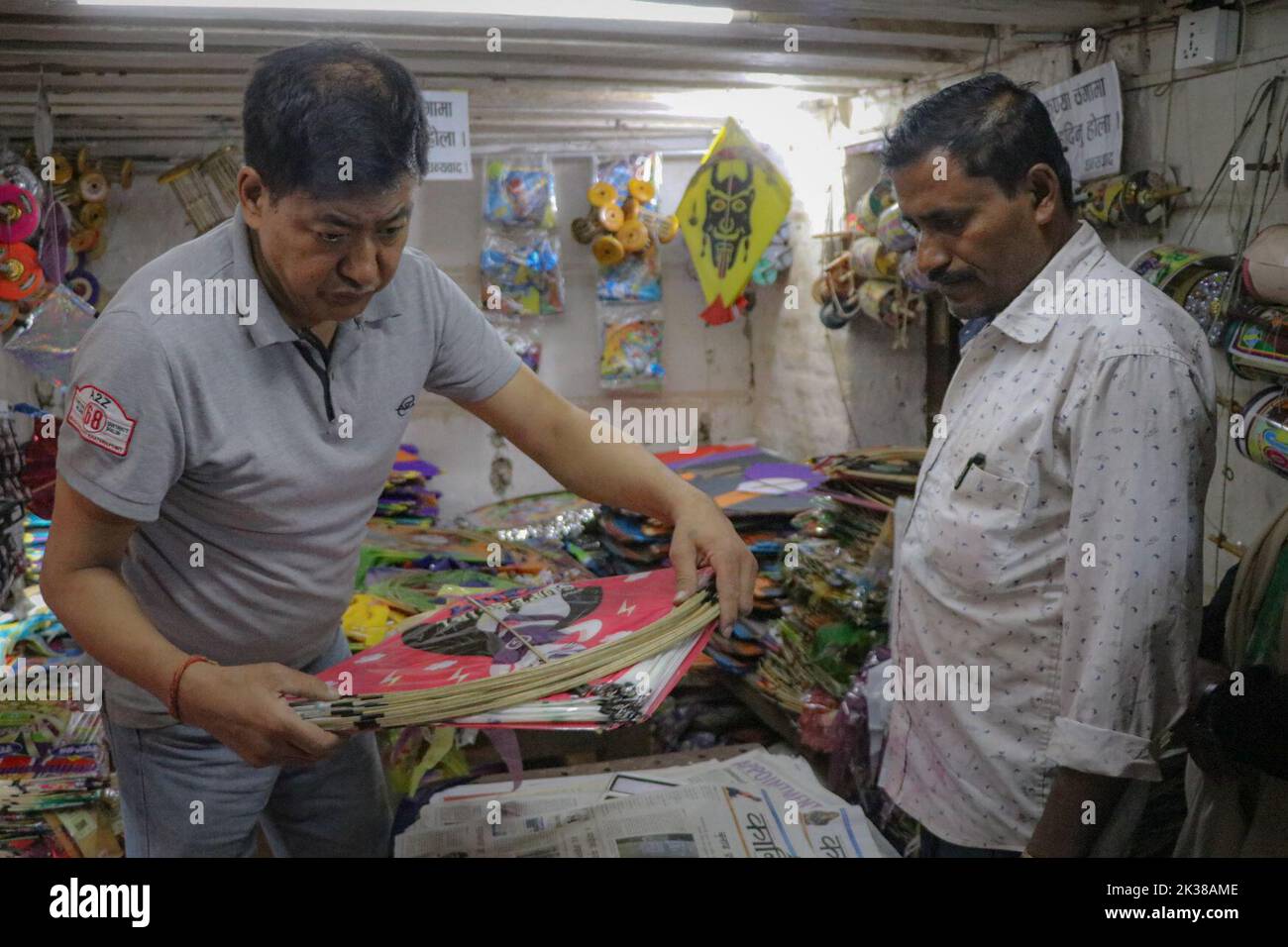 On September.25,,2022 in Kathmandu, Nepal. A man shows kite to his ...