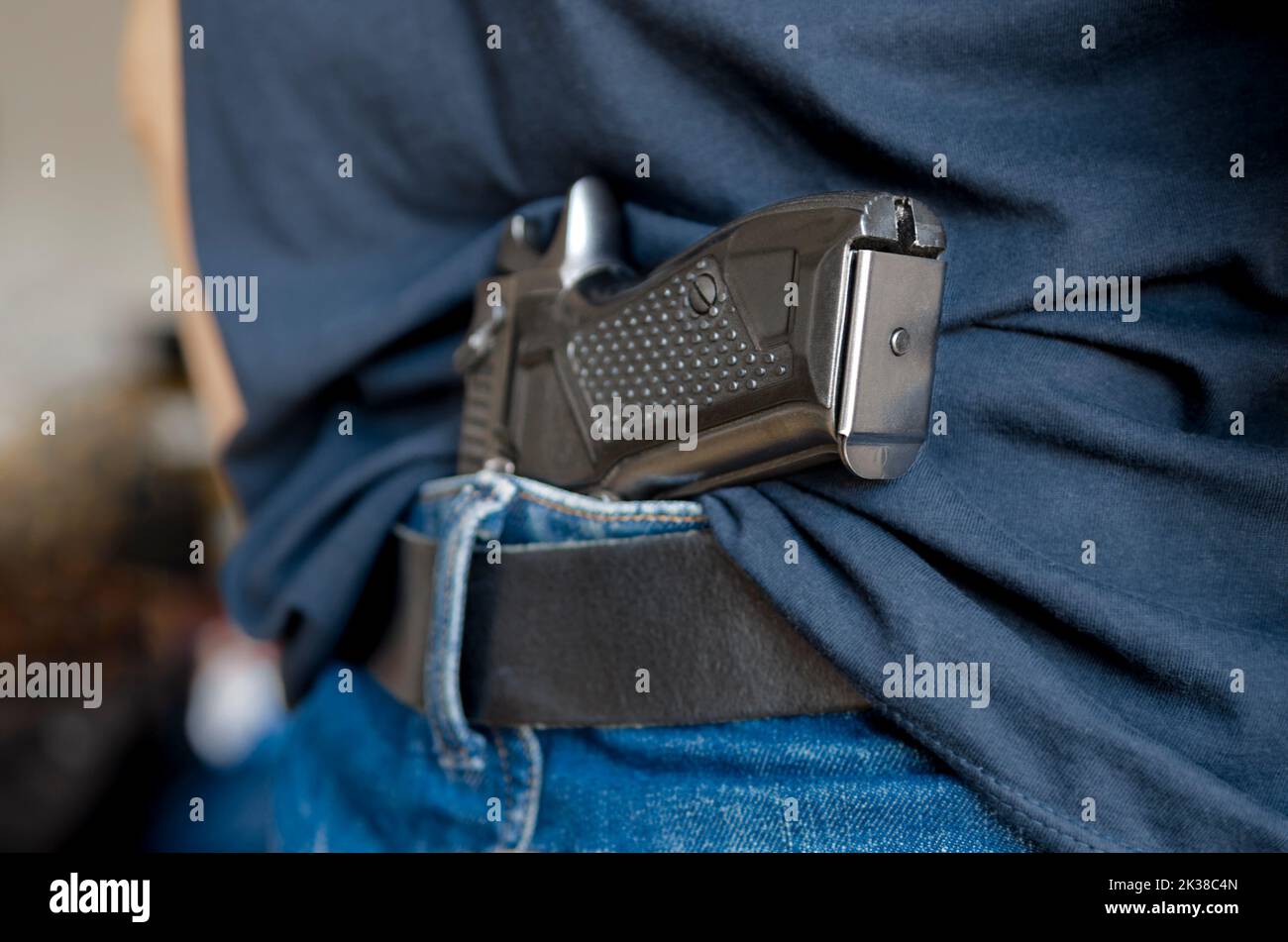 Black traumatic gun hi-res stock photography and images - Alamy