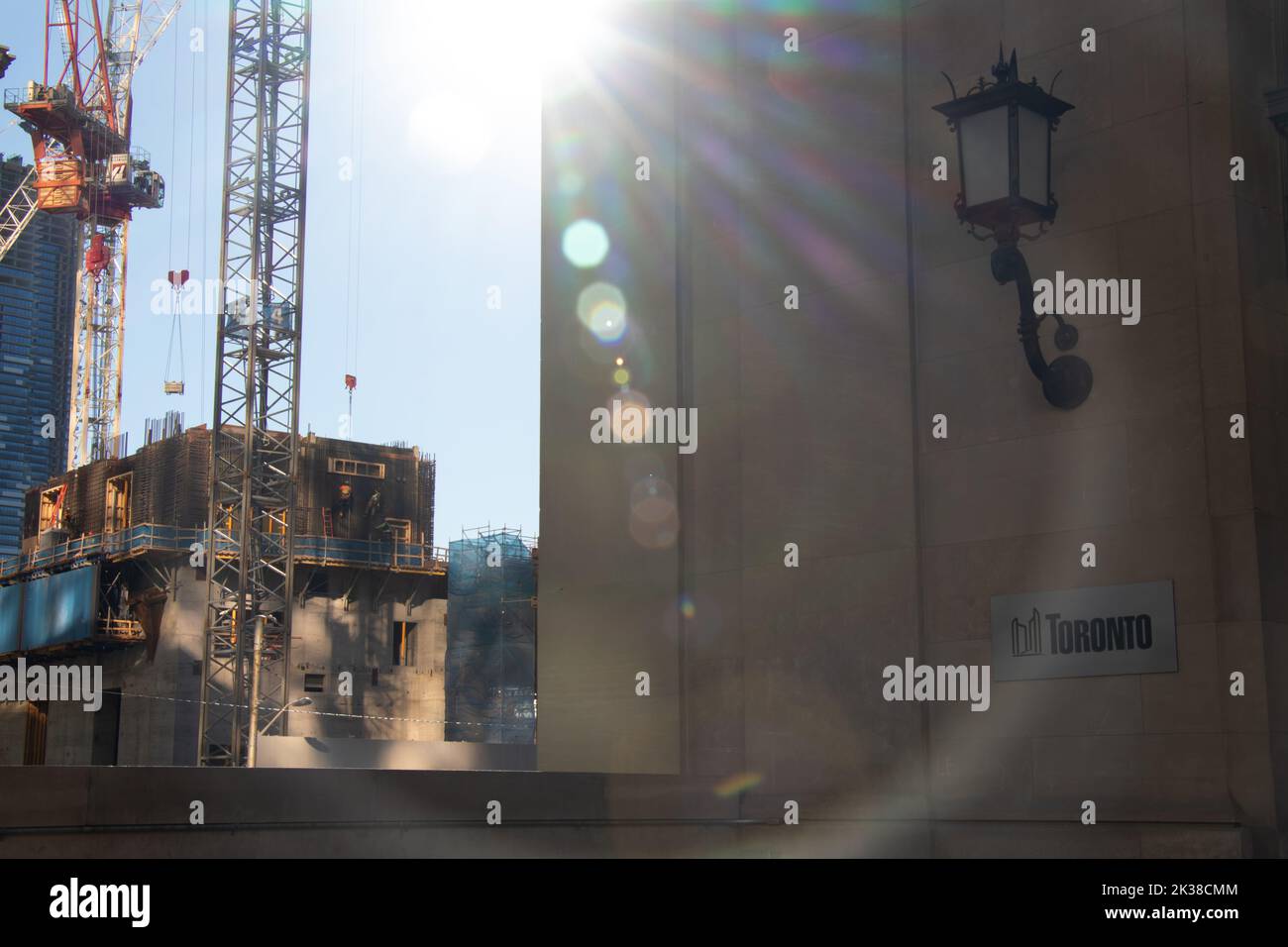 The sun glares down on a City of Toronto lgoo on Toronto's Union ...