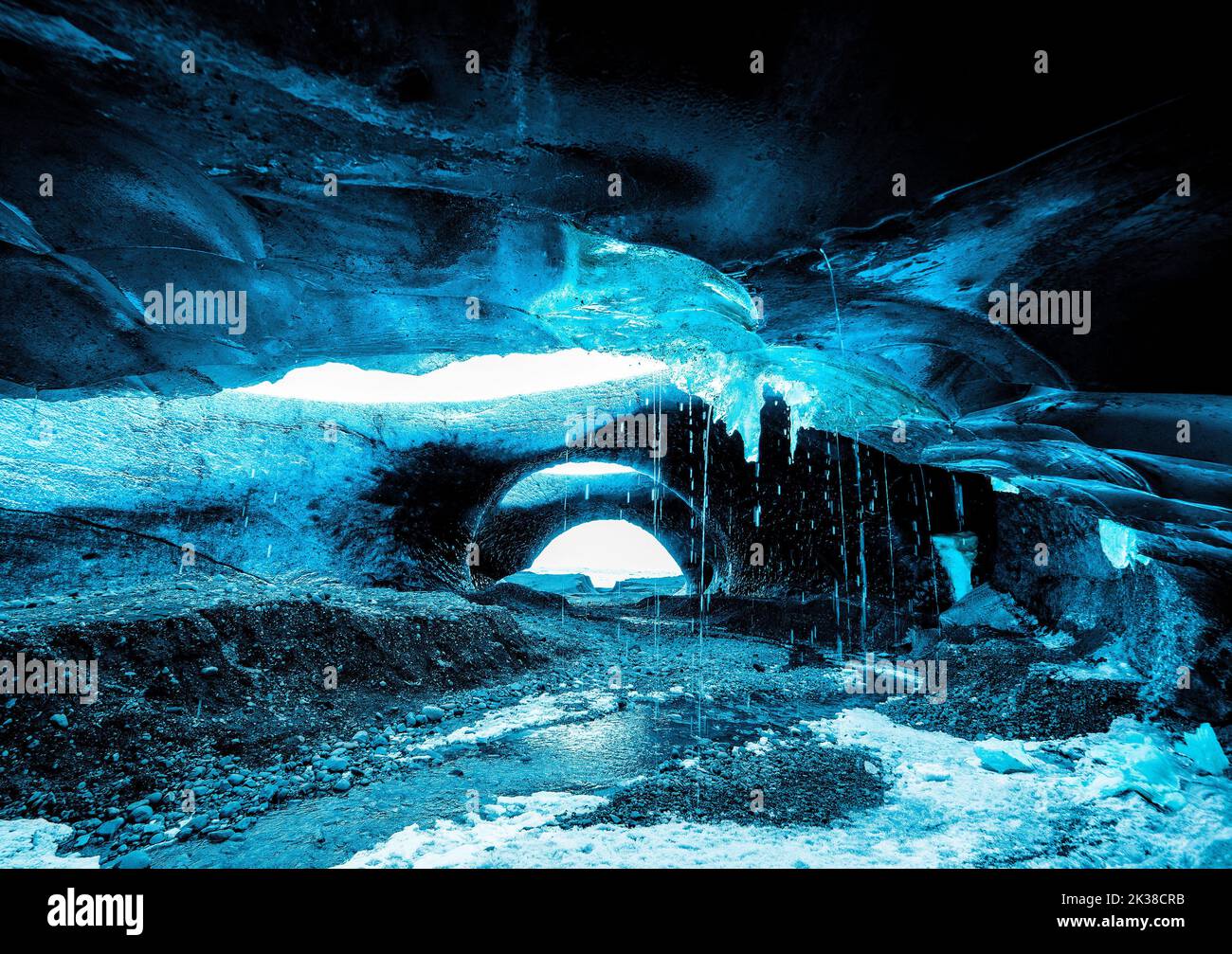 An aerial view frozen cave with melting ice in Iceland Stock Photo - Alamy