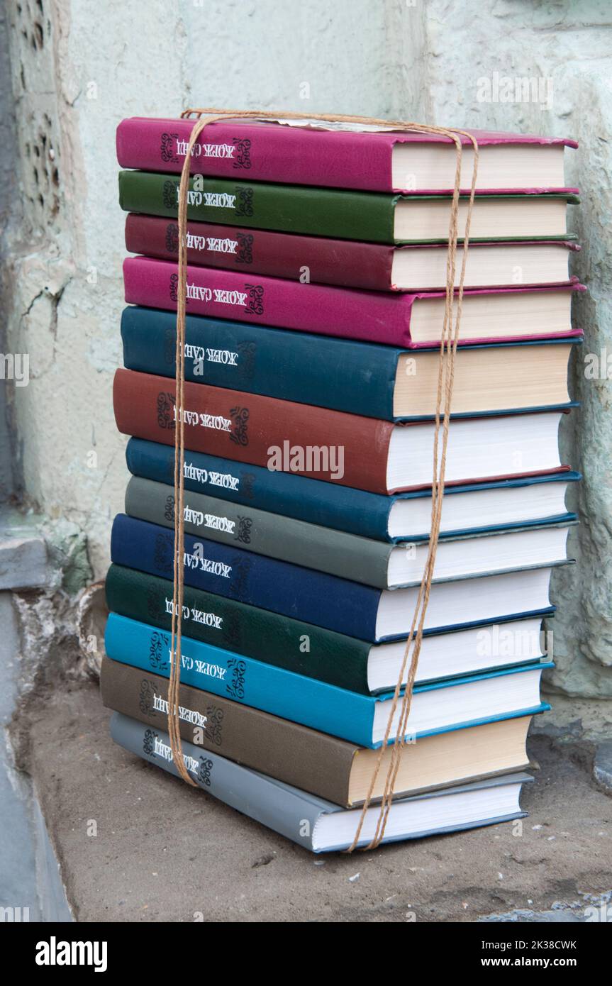 A vertical shot of a stack of colorful Russian books tied Stock Photo ...