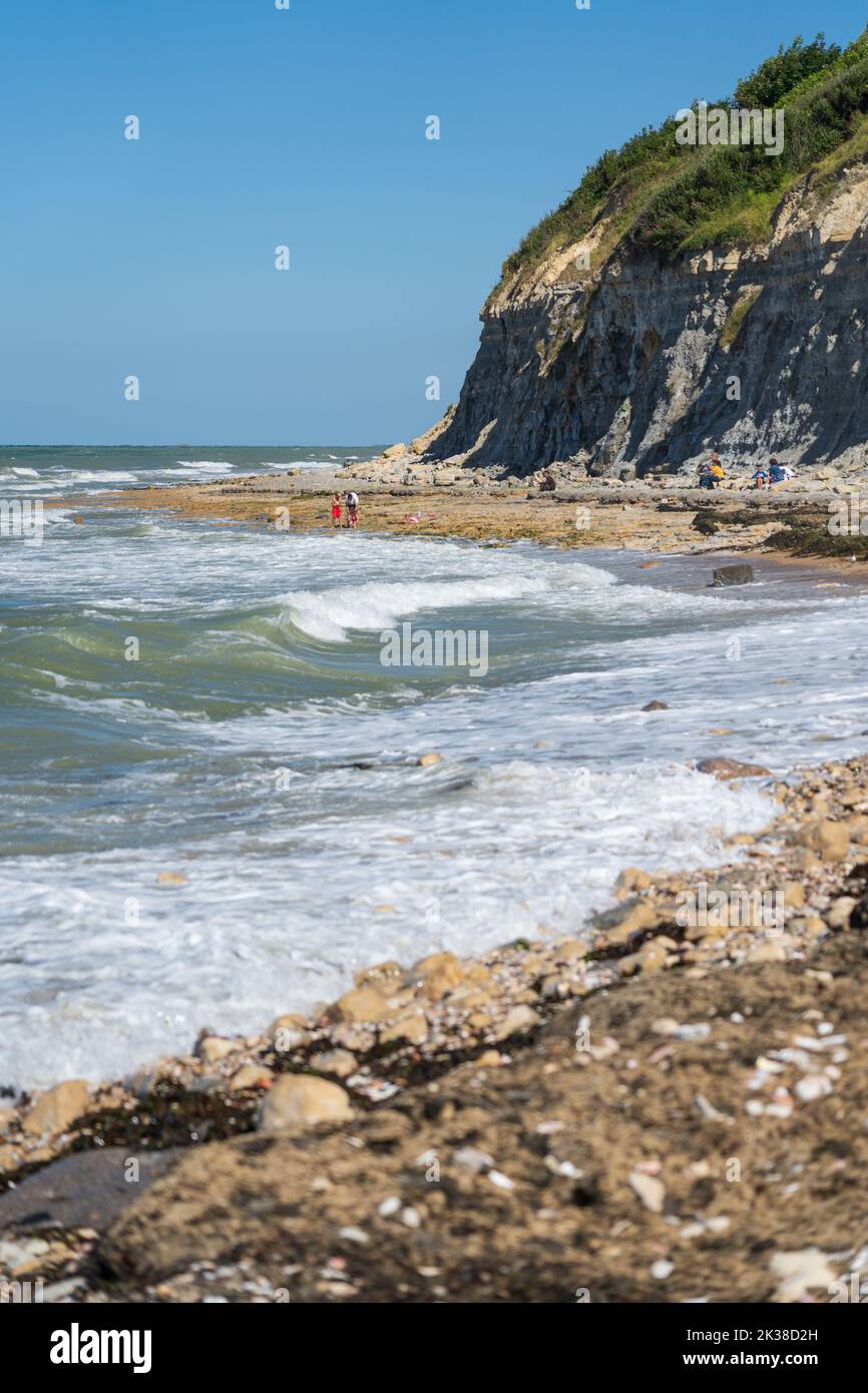 The shell beach at cliffs at Port-en-Bessin, Normandy Stock Photo - Alamy
