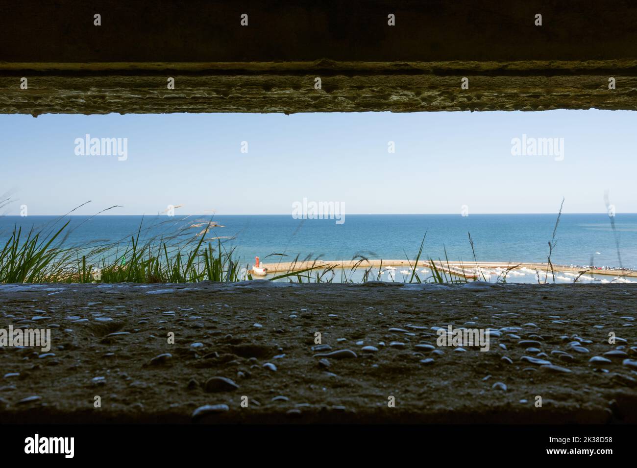 View out from one of the Atlantic sea wall defence bunkers near Port-en ...