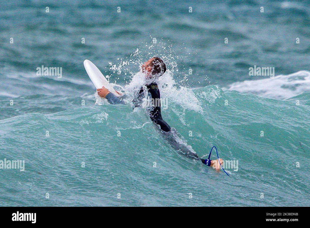 A person surfs on 1,5 meter wave during strong winds at Beach Marlera ...