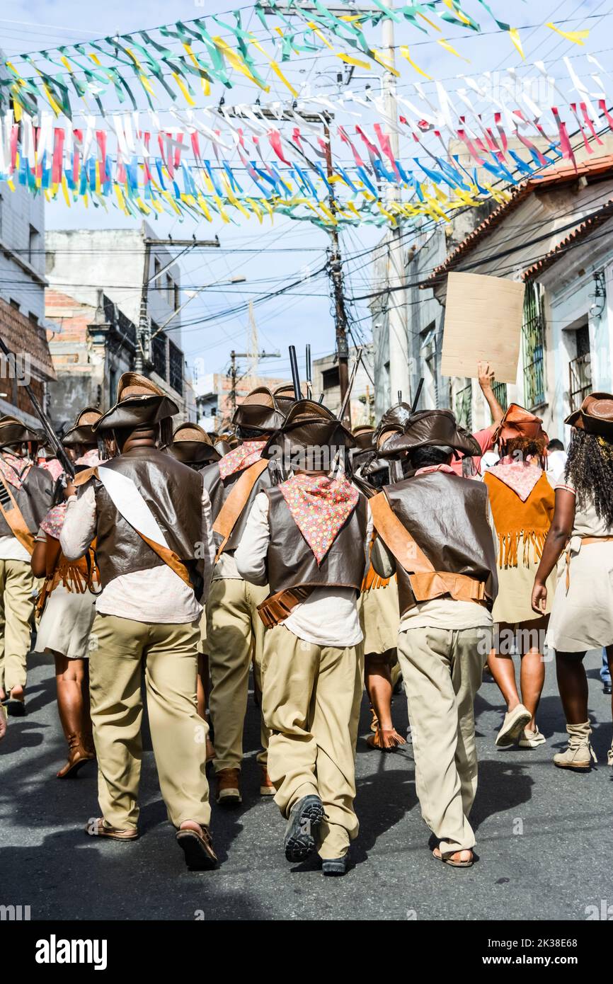 The vertical view of people wearing pirate costumes and weapons on ...