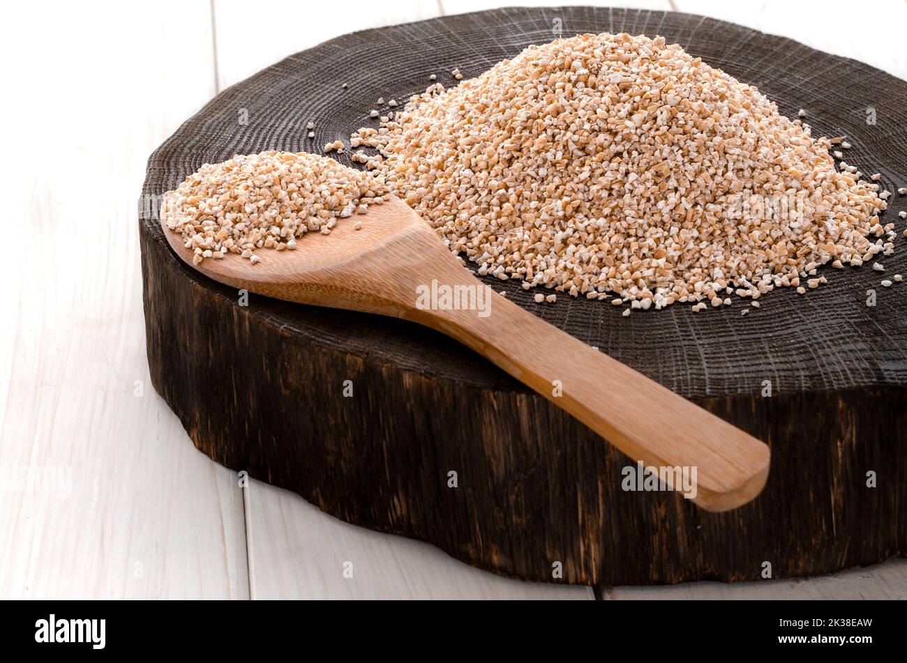 Raw dried broken barley cereal grain texture background macro closeup ...