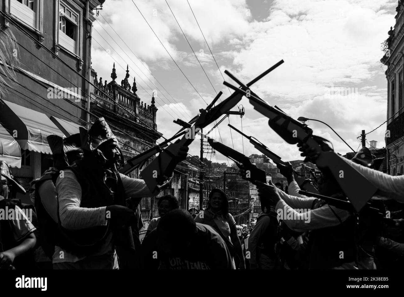 The grayscale of people wearing pirate costumes and weapons on Bahia's ...