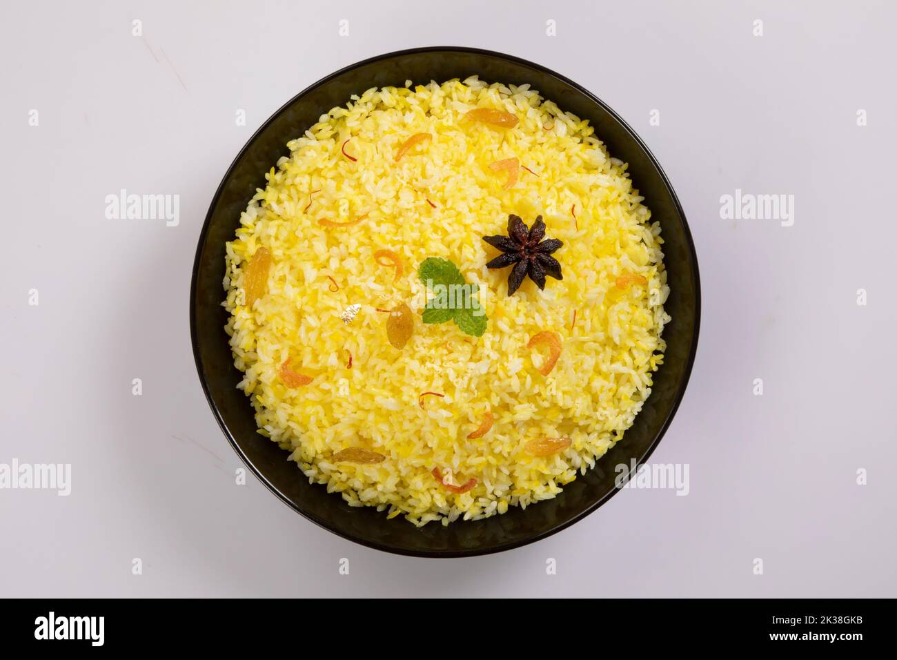 Star anise placed on cooked rice with use of selective focus on a ...