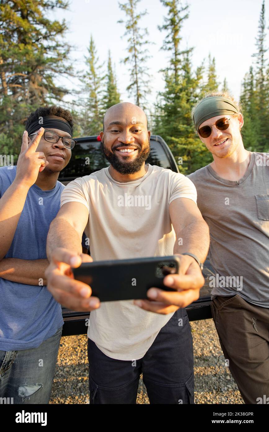 Group selfie behind hi-res stock photography and images - Alamy