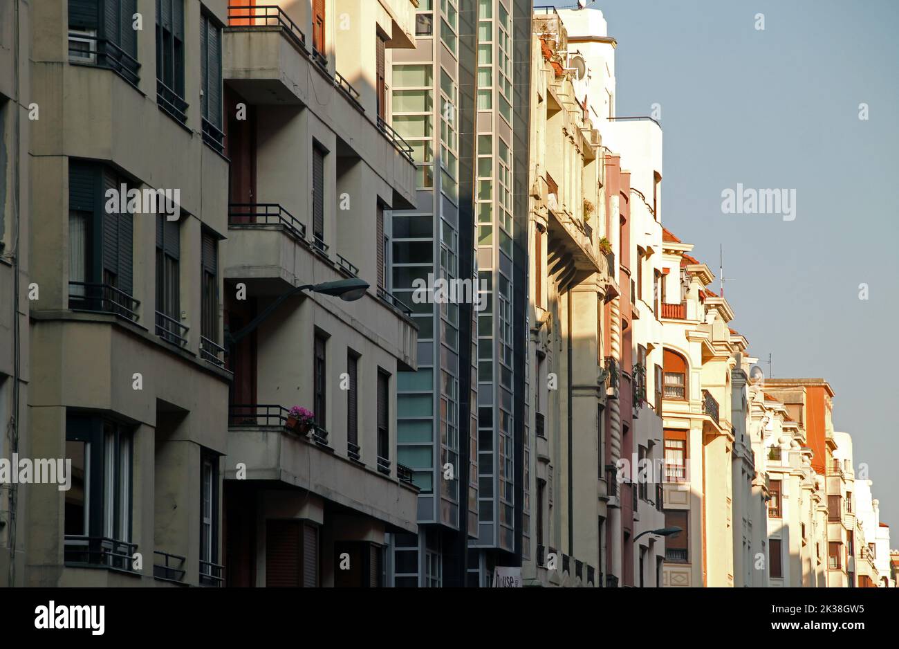 A beautiful view of apartment buildings with small windows Stock Photo ...