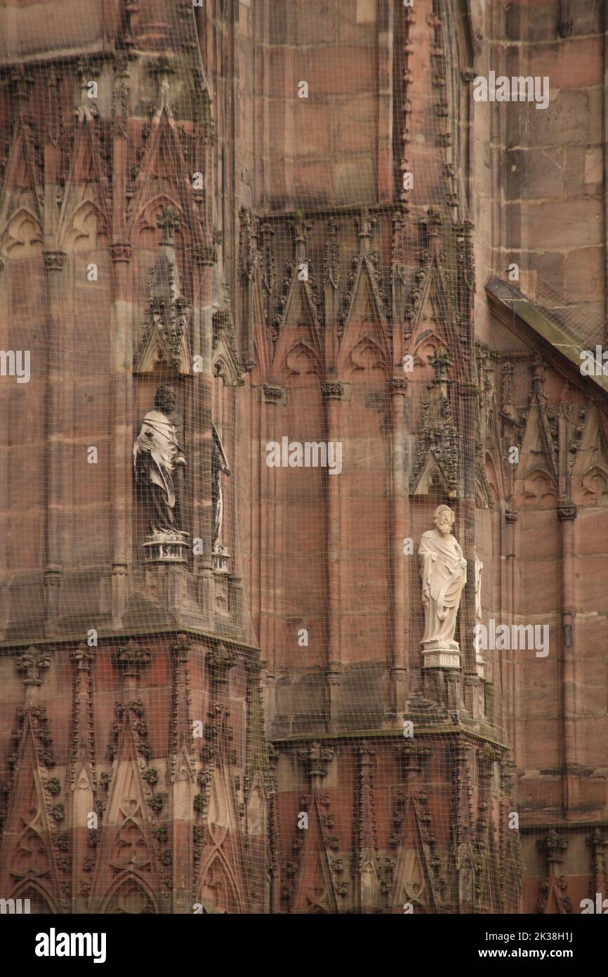 A beautiful view of an old traditional building with statues in ...