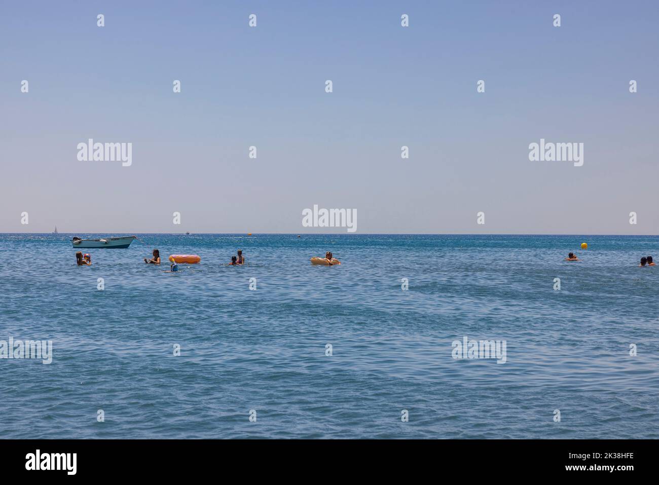 Family beach sand sea inflatable hi-res stock photography and images ...