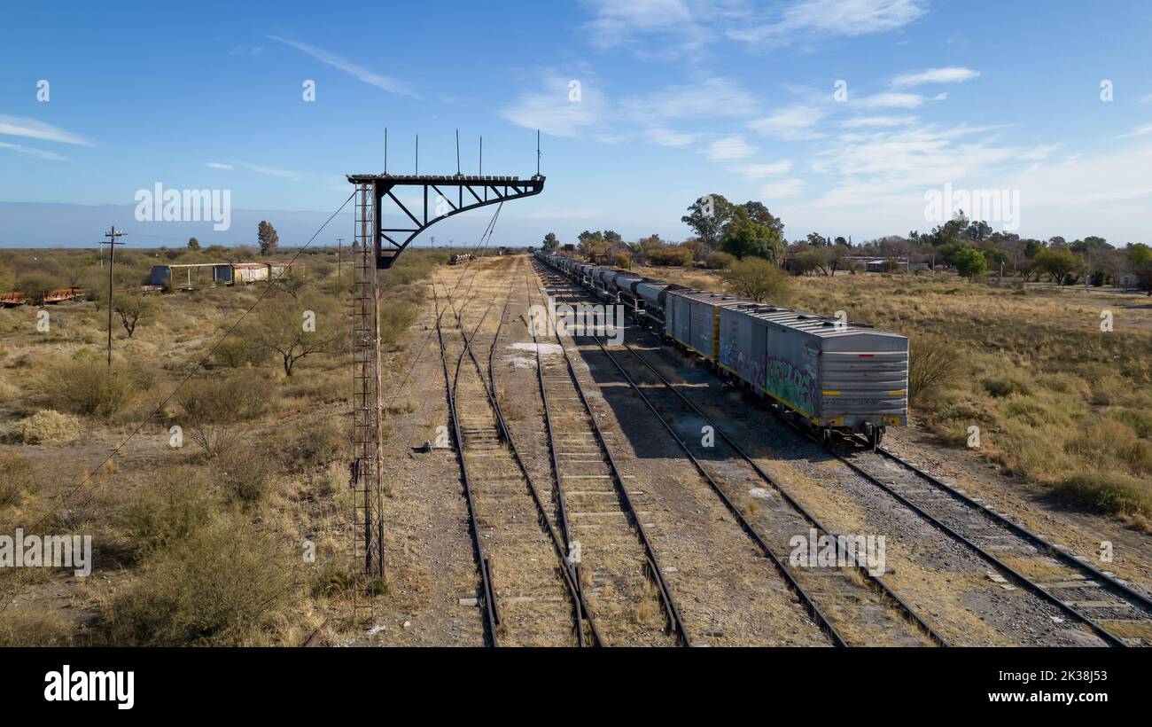 An aerial view of old freight railroad cars driving on the trucks Stock ...