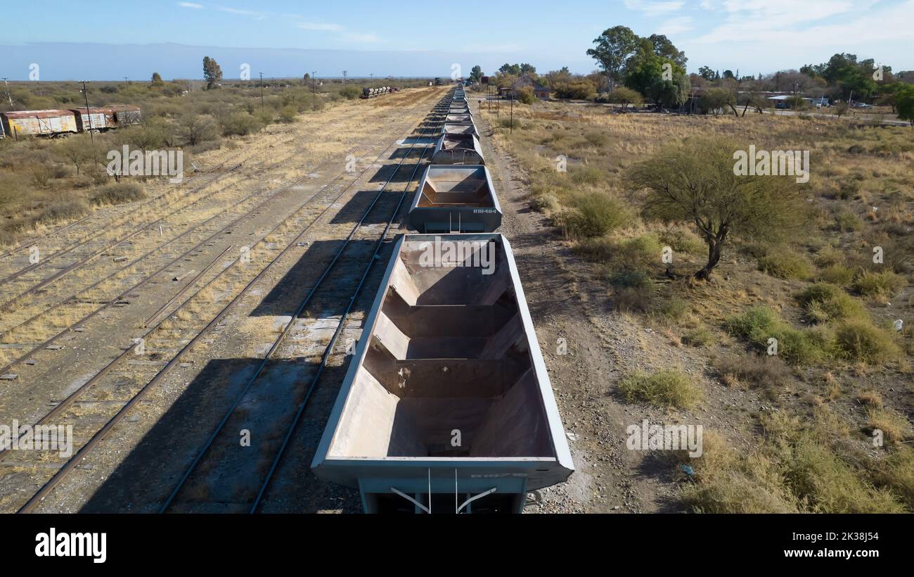 An aerial view of old freight railroad cars driving on the trucks Stock ...