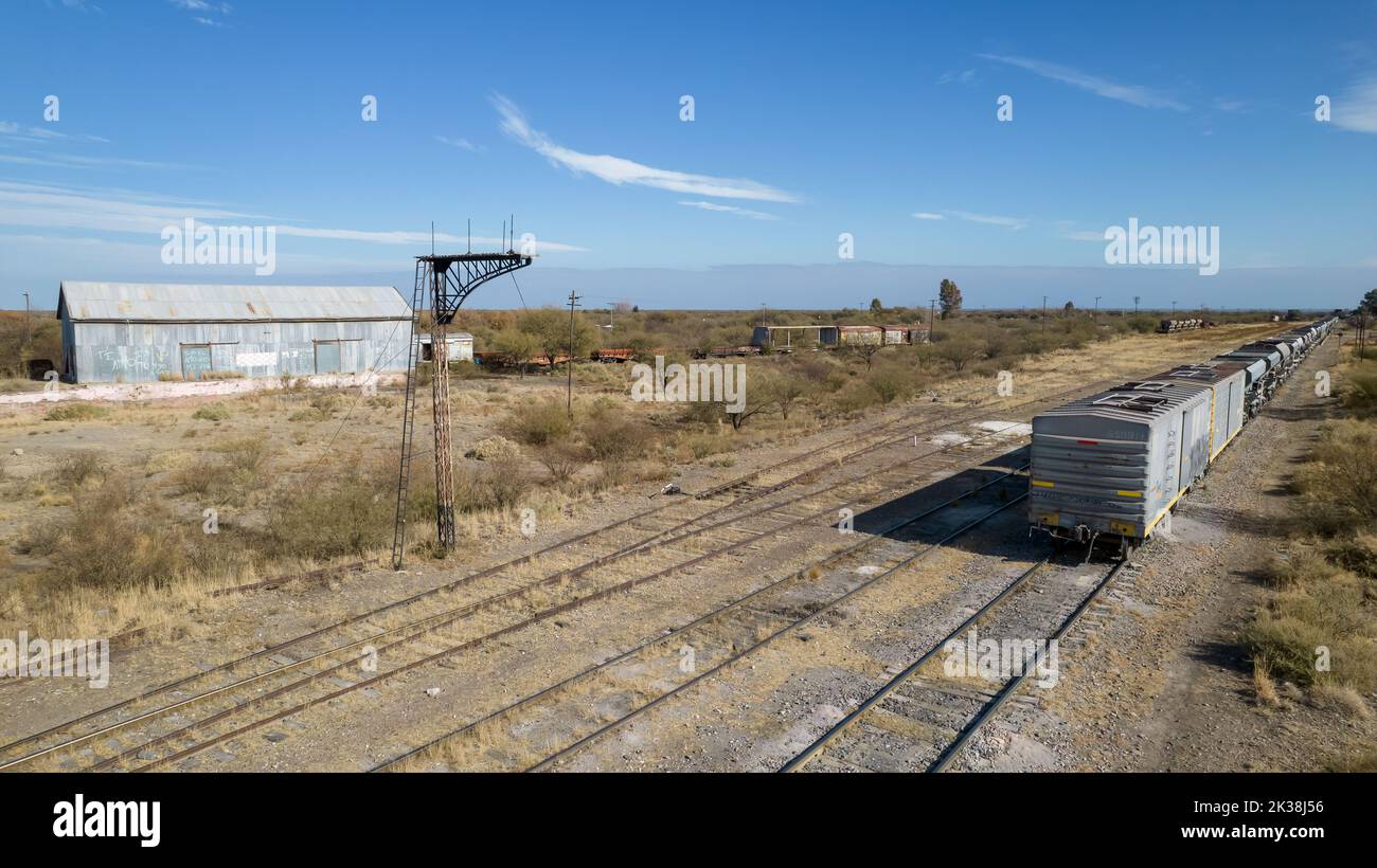 An aerial view of old freight railroad cars driving on the trucks Stock ...