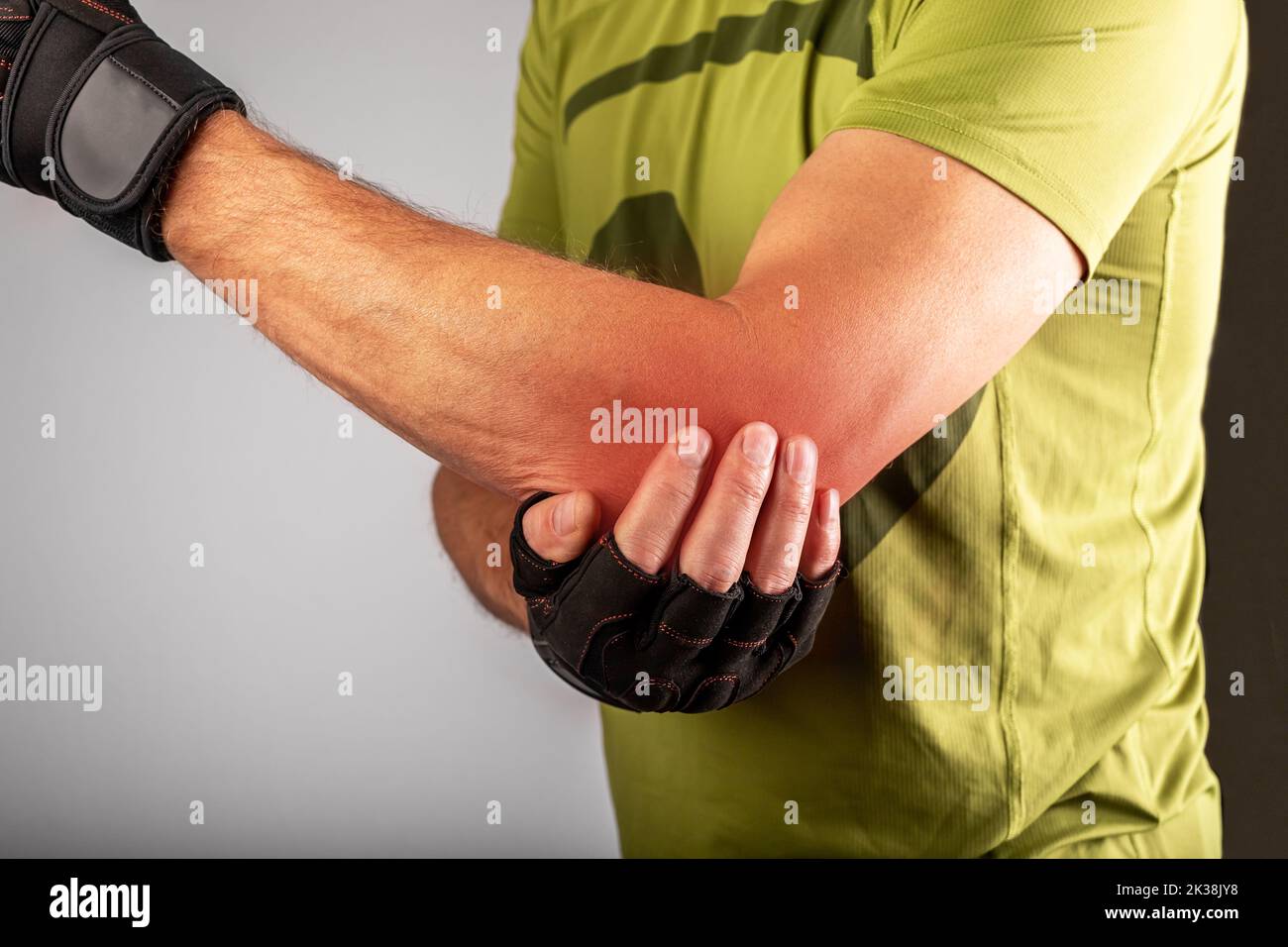 Elbow pain of athlete. Arm trauma, injury in gym. High quality photo ...