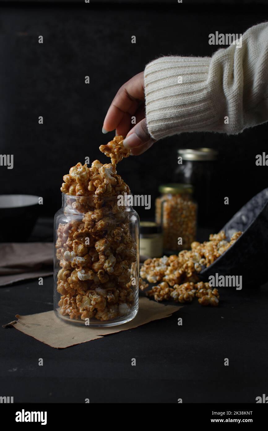 Picking popcorn hi-res stock photography and images - Alamy