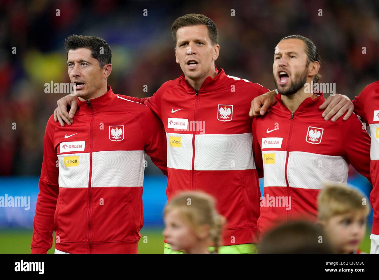 Poland's Robert Lewandowski (left) lines up with team-mates before the ...