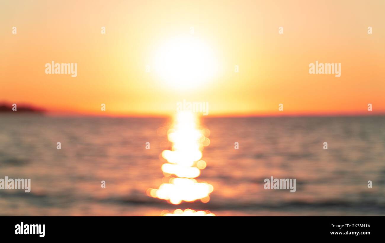 Blurry sunset photography. Blurry sunray background or wallpaper. Golden hour at sunset concept ...