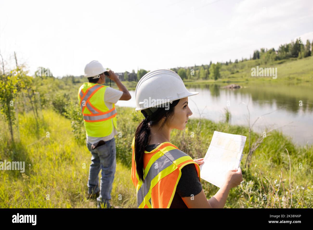 Workers surveying hi-res stock photography and images - Alamy