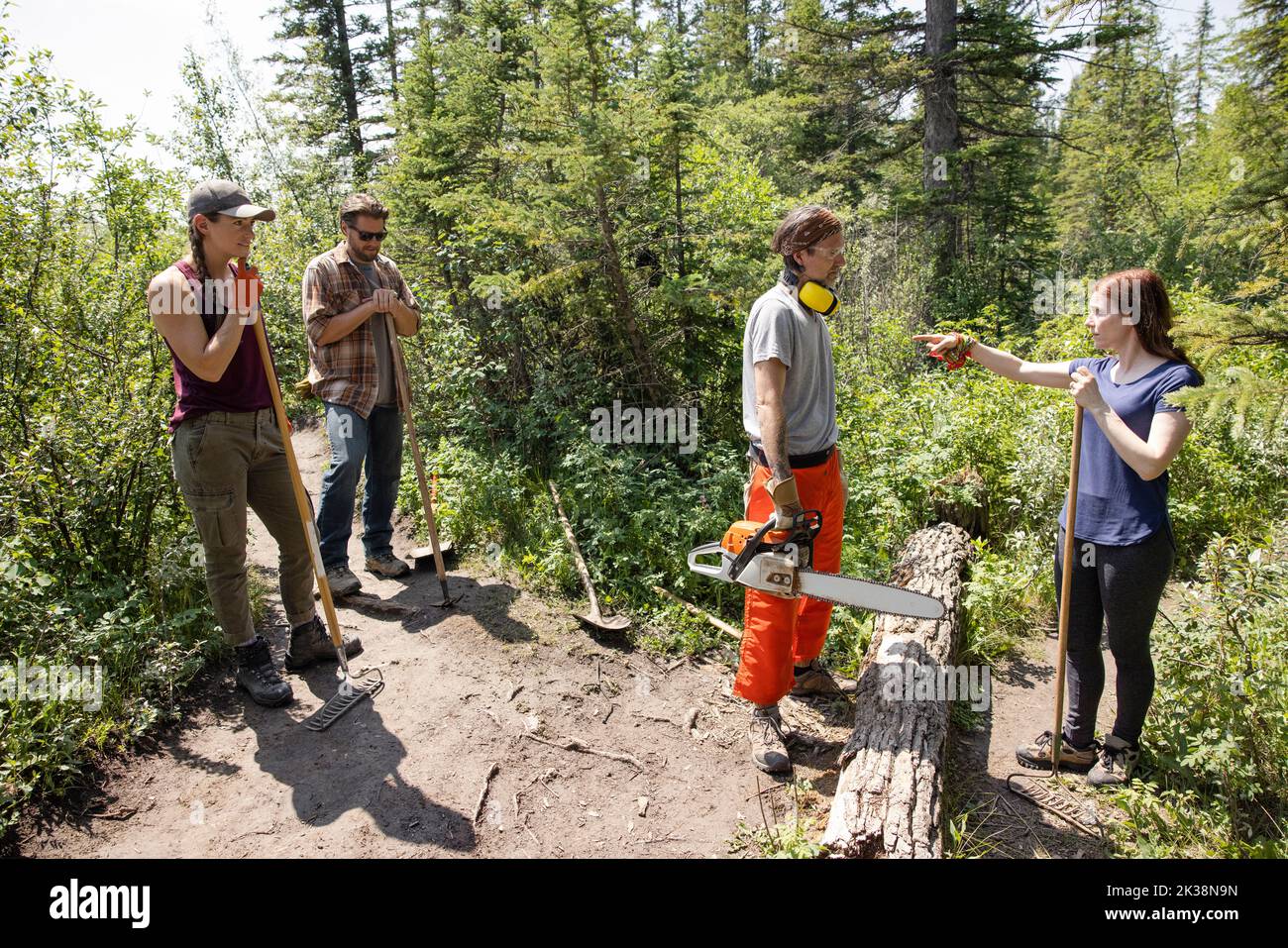 Chainsaw volunteers hi-res stock photography and images - Alamy