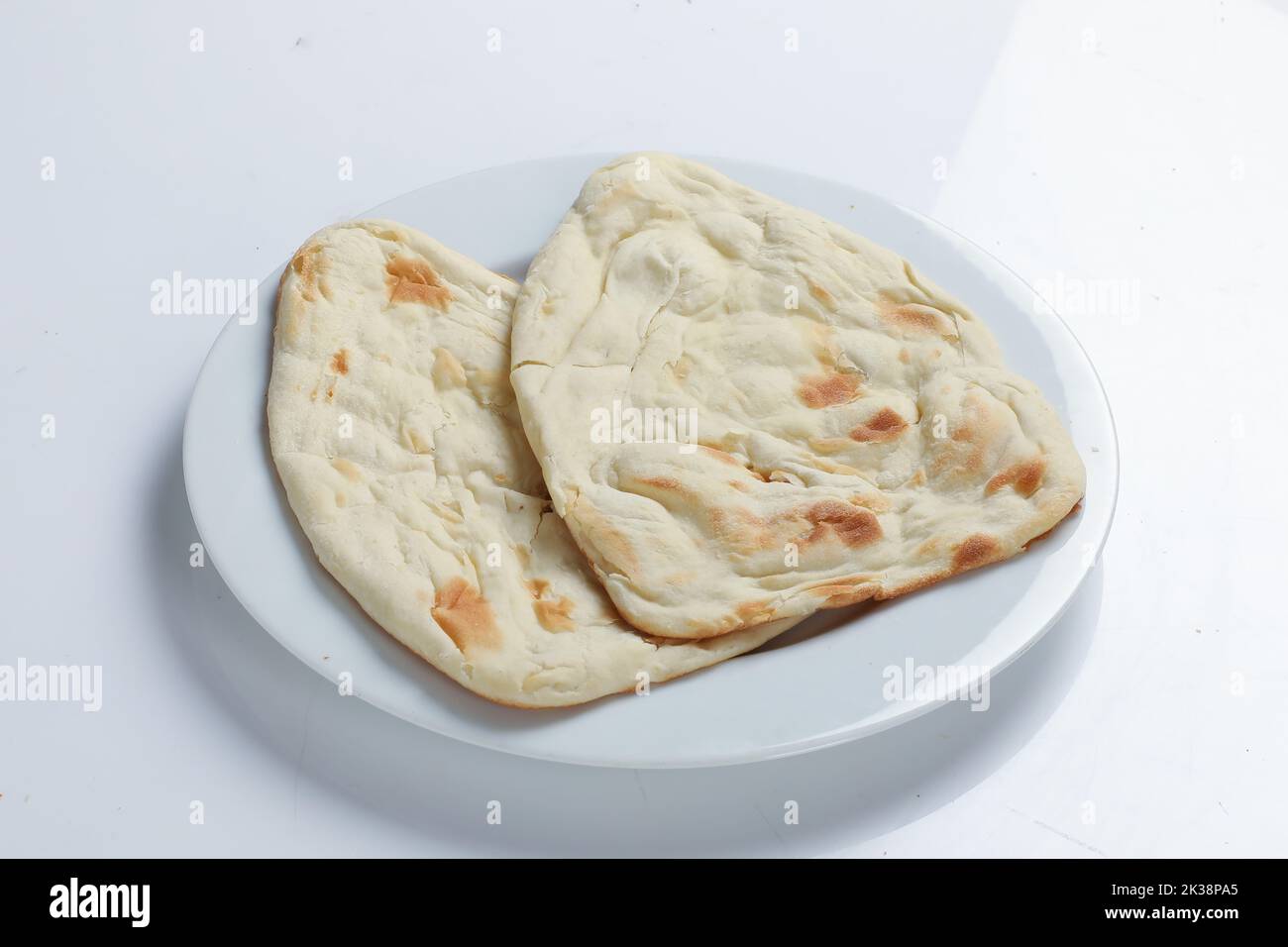 Tandoori Nan or Tandoori Naan isolated on white background Stock Photo ...