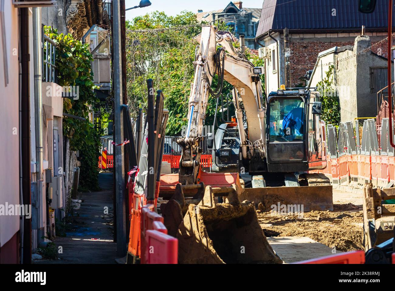Detail of industrial excavator working on construction site Stock Photo ...