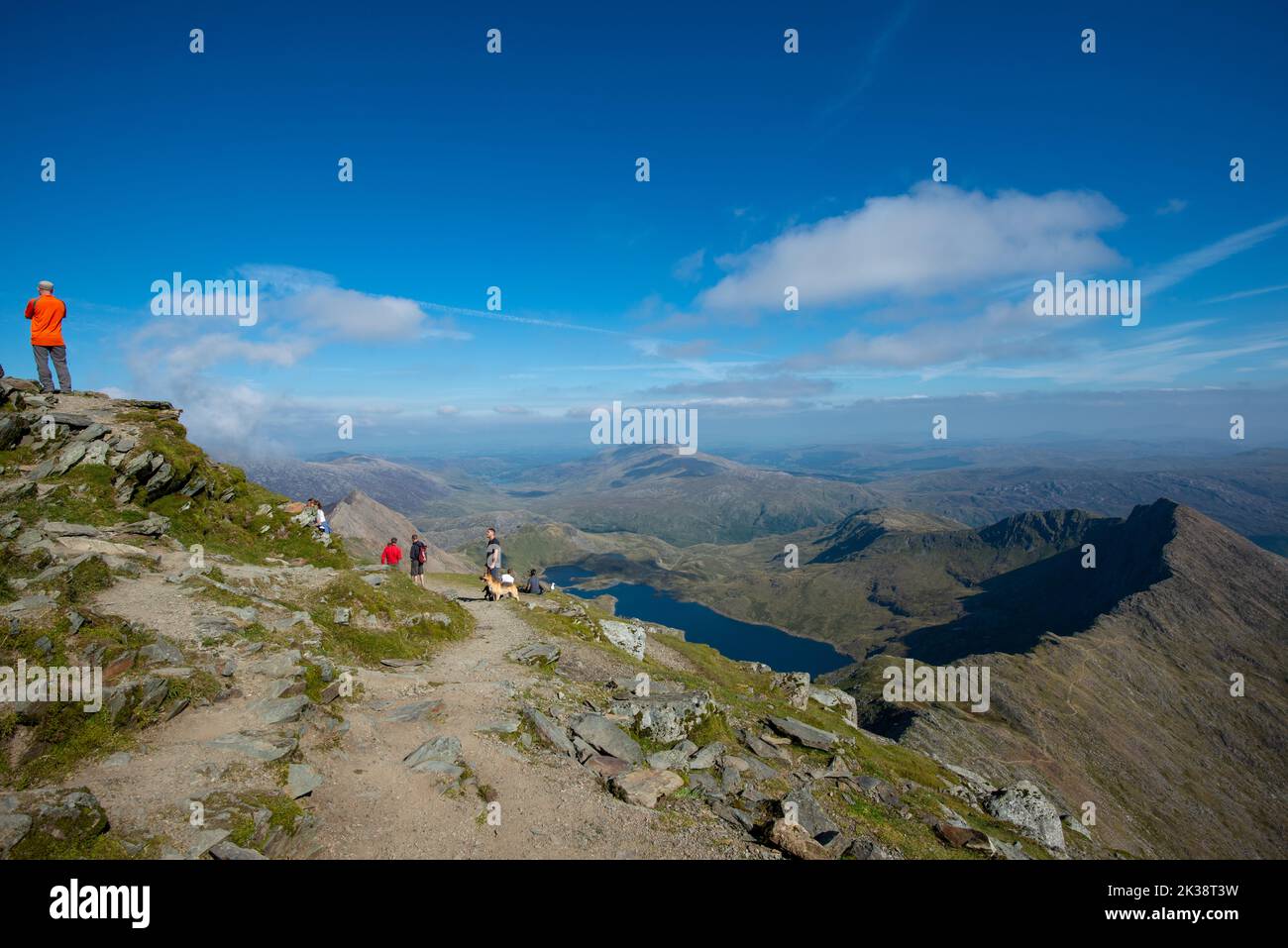 People up top the summit of Mount Snowdon, North Wales Stock Photo - Alamy