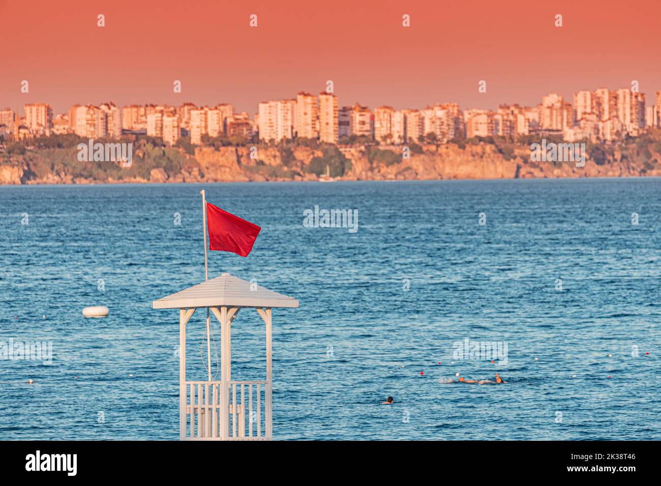 Rescue lifeguard tower with red flag at the Antalya Konyaalti beach ...