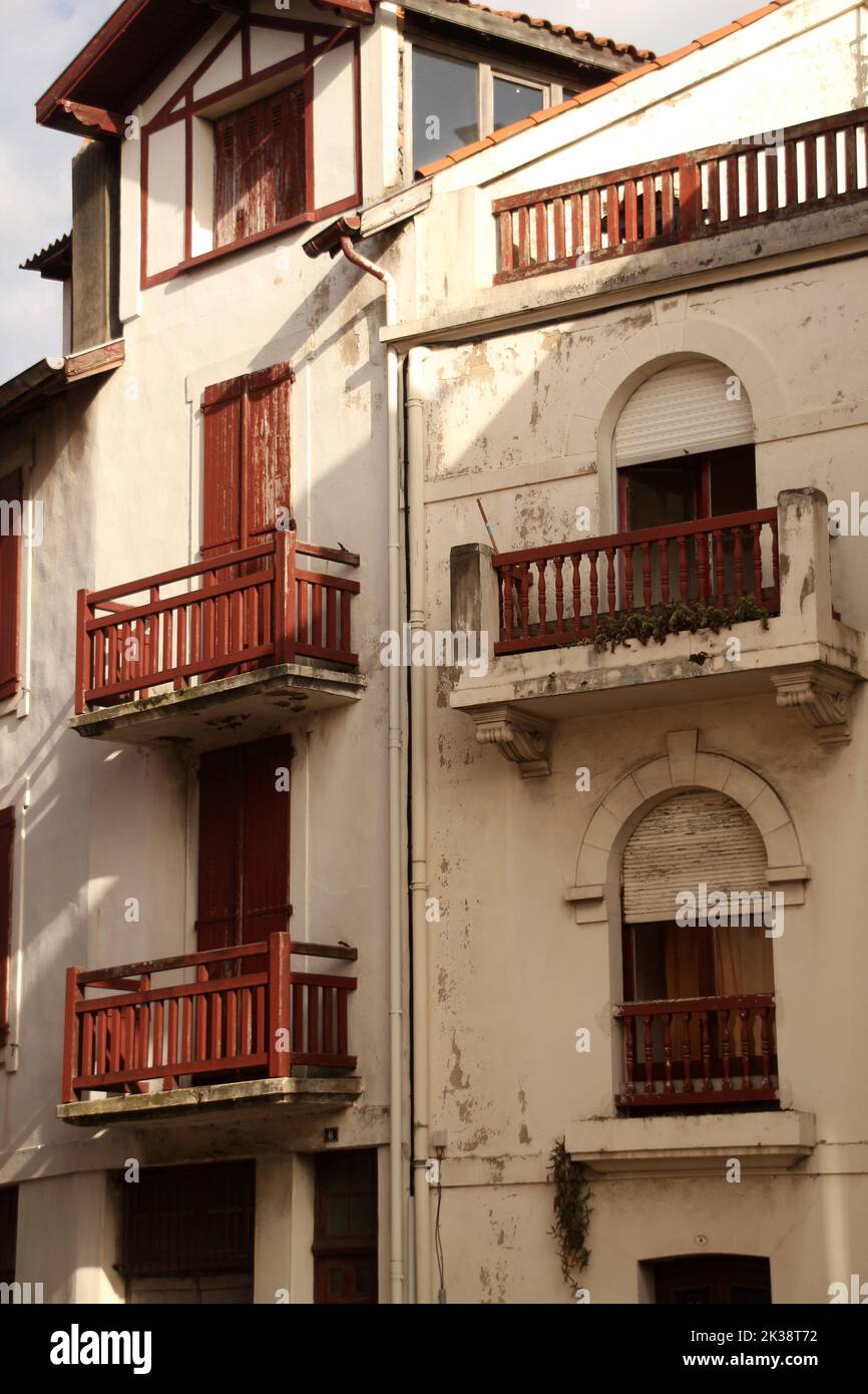 A beautiful view of a traditional house with balconies in Espelette ...